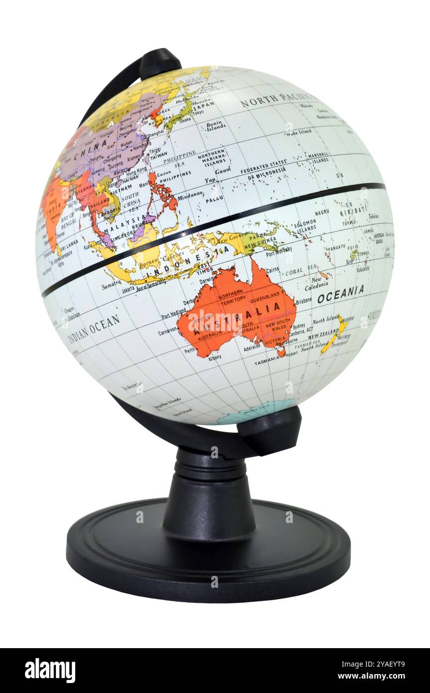 Isolated world globe with black stand on a white background, Focusing on Australia Stock Photo ...