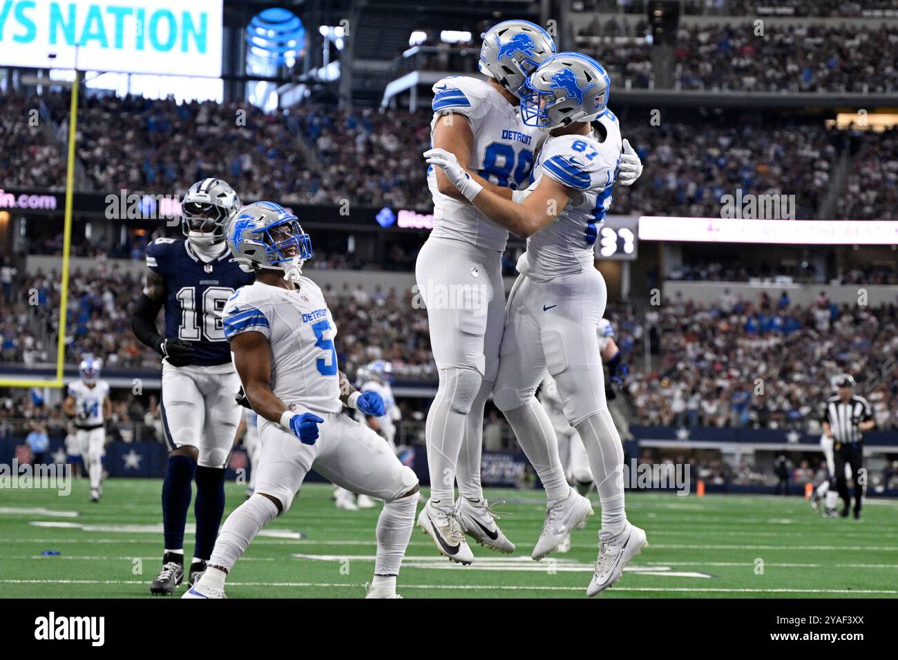 Detroit Lions' David Montgomery (5), Brock Wright (89) and Sam LaPorta ...