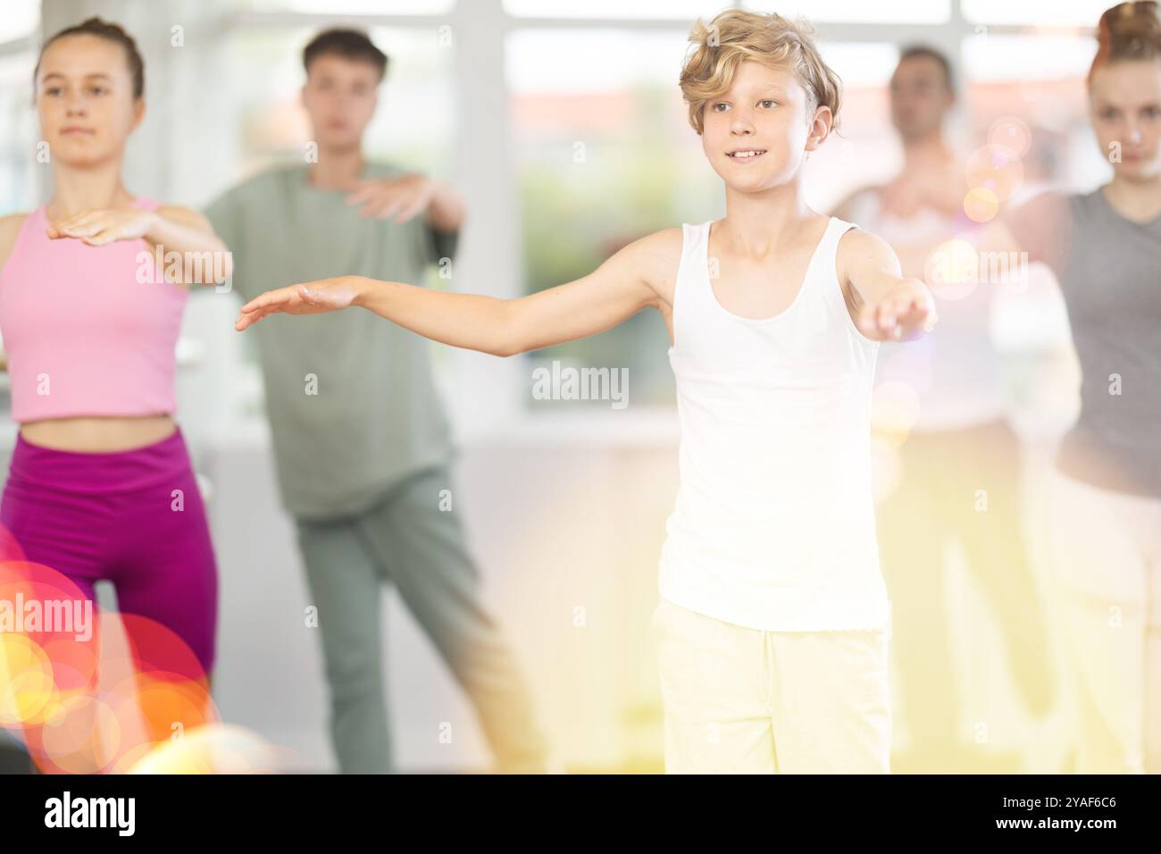 Teenage boy practicing ballet positions in dance studio Stock Photo - Alamy