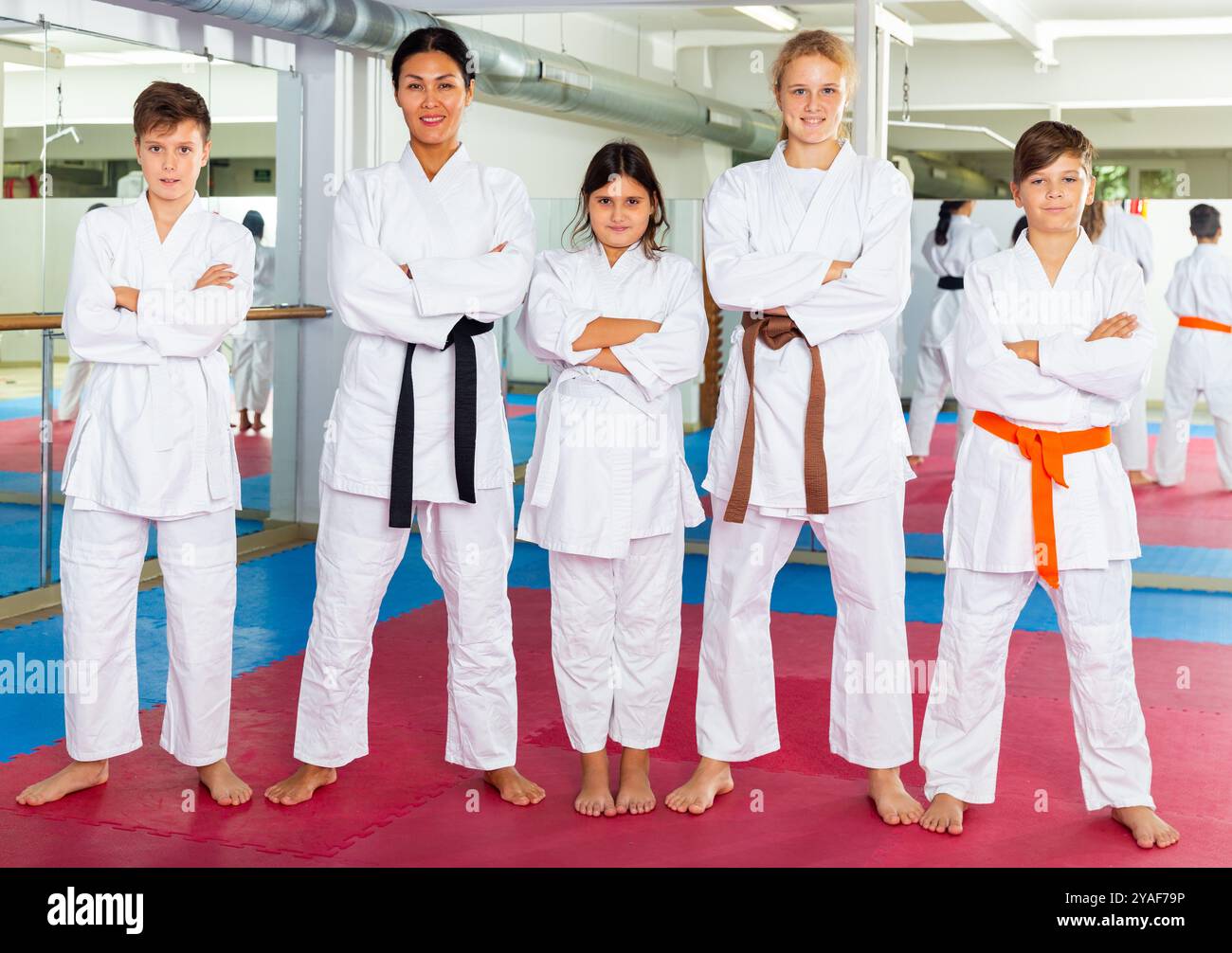 Portrait of coach with his karate students in sports club Stock Photo ...