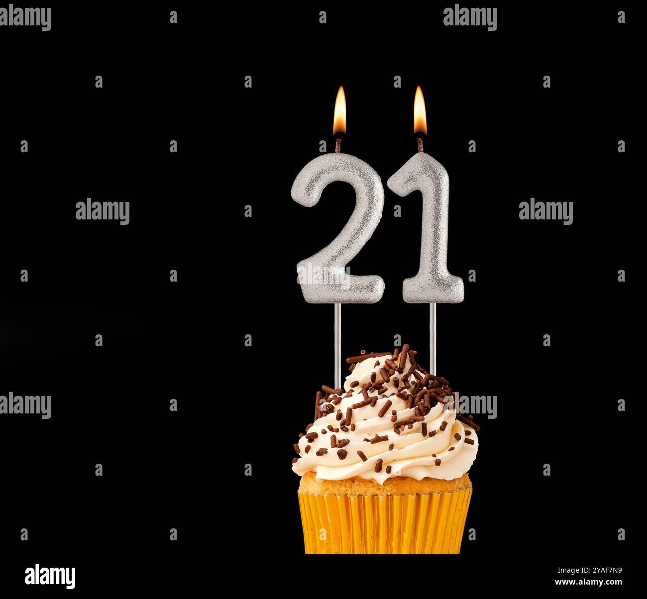 Birthday cupcake on black background - Number 21 shaped candles Stock ...