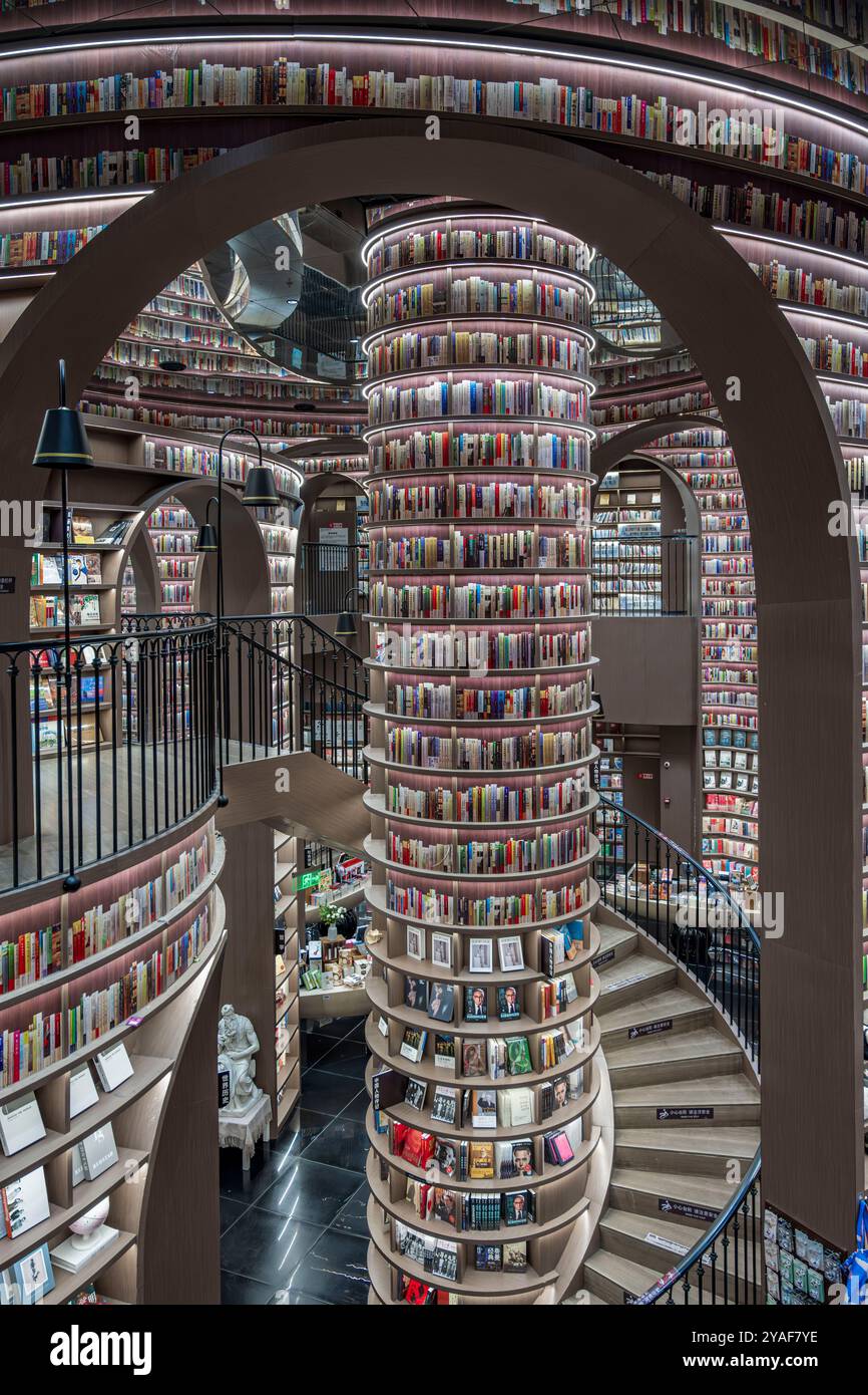 CHENGDU, CHINA - OCTOBER 13, 2024 - Visitors read books at Zhongshuge ...