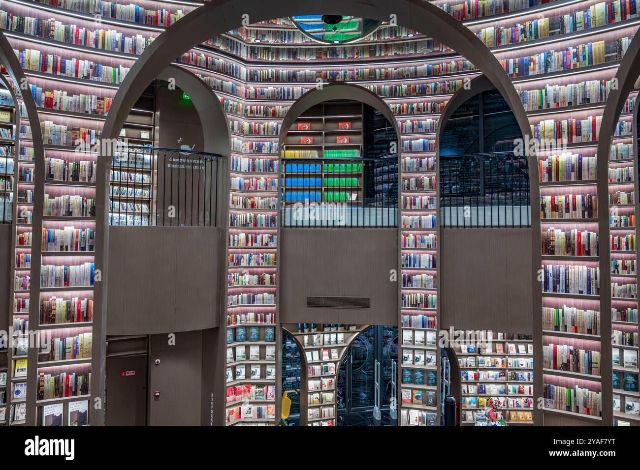 CHENGDU, CHINA - OCTOBER 13, 2024 - Visitors read books at Zhongshuge ...