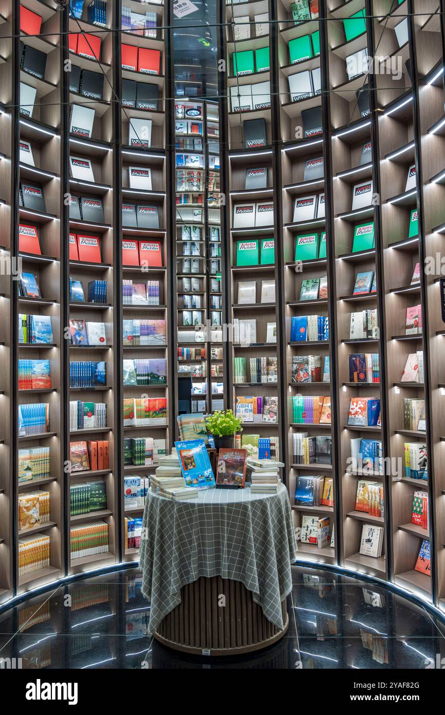 CHENGDU, CHINA - OCTOBER 13, 2024 - Visitors read books at Zhongshuge ...