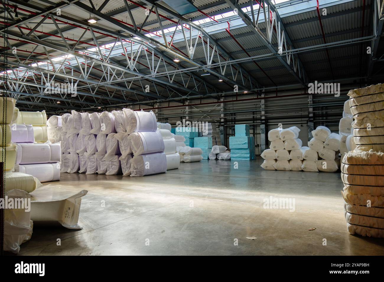 Blocks of foam rubber in warehouse Stock Photo - Alamy