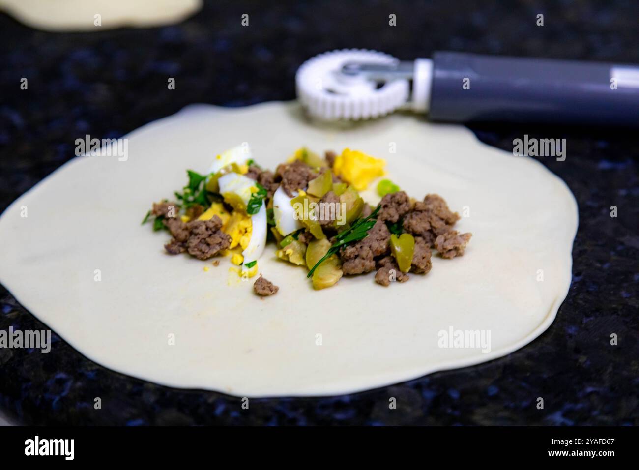 Traditional rustic Brazilian pastry, fried and stuffed with ground beef ...