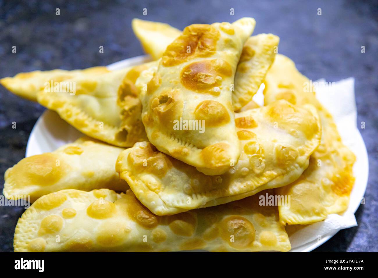 Traditional rustic Brazilian pastry, fried and stuffed with ground beef ...