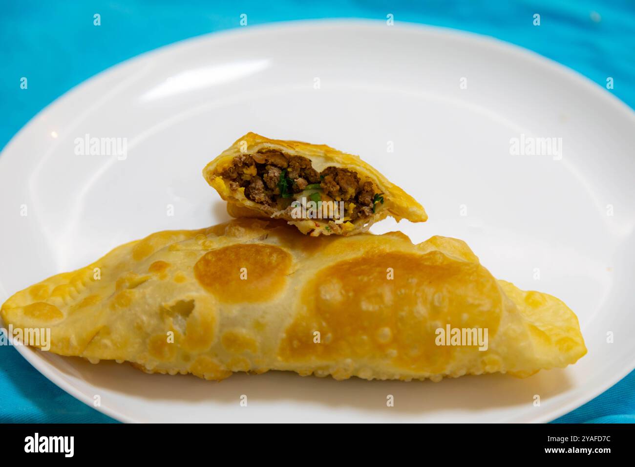 Traditional rustic Brazilian pastry, fried and stuffed with ground beef ...