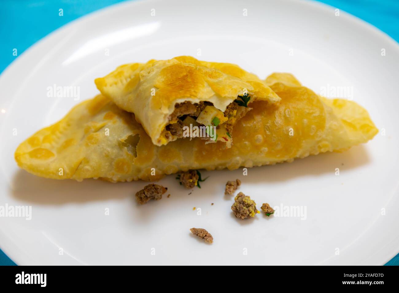 Traditional rustic Brazilian pastry, fried and stuffed with ground beef ...