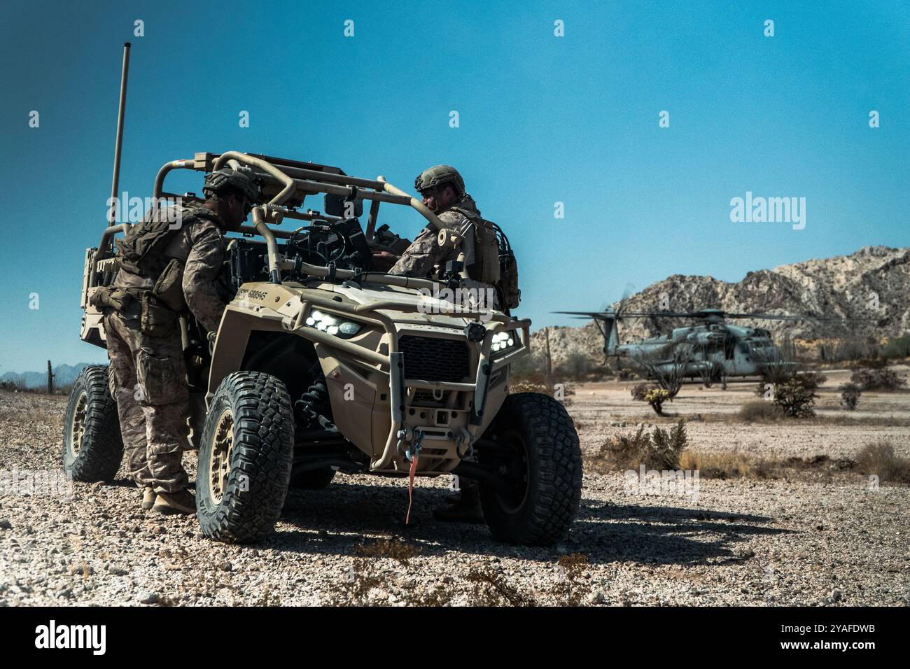U.S. Marine Corps Cpl. Jacob Hardin, left, an Evansville, Indiana ...