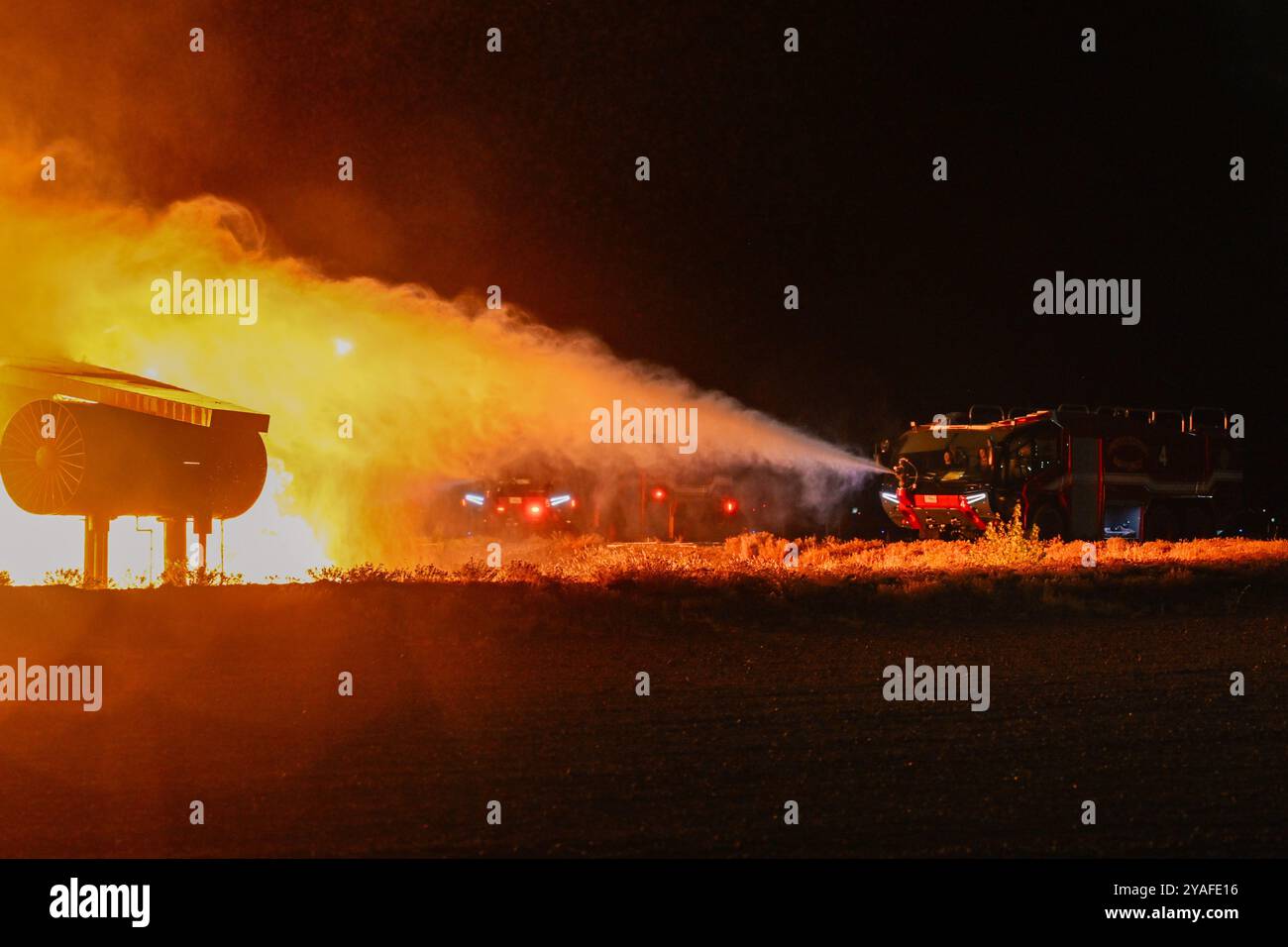 Firefighters from the 97th Civil Engineer Squadron extinguish a fire in ...