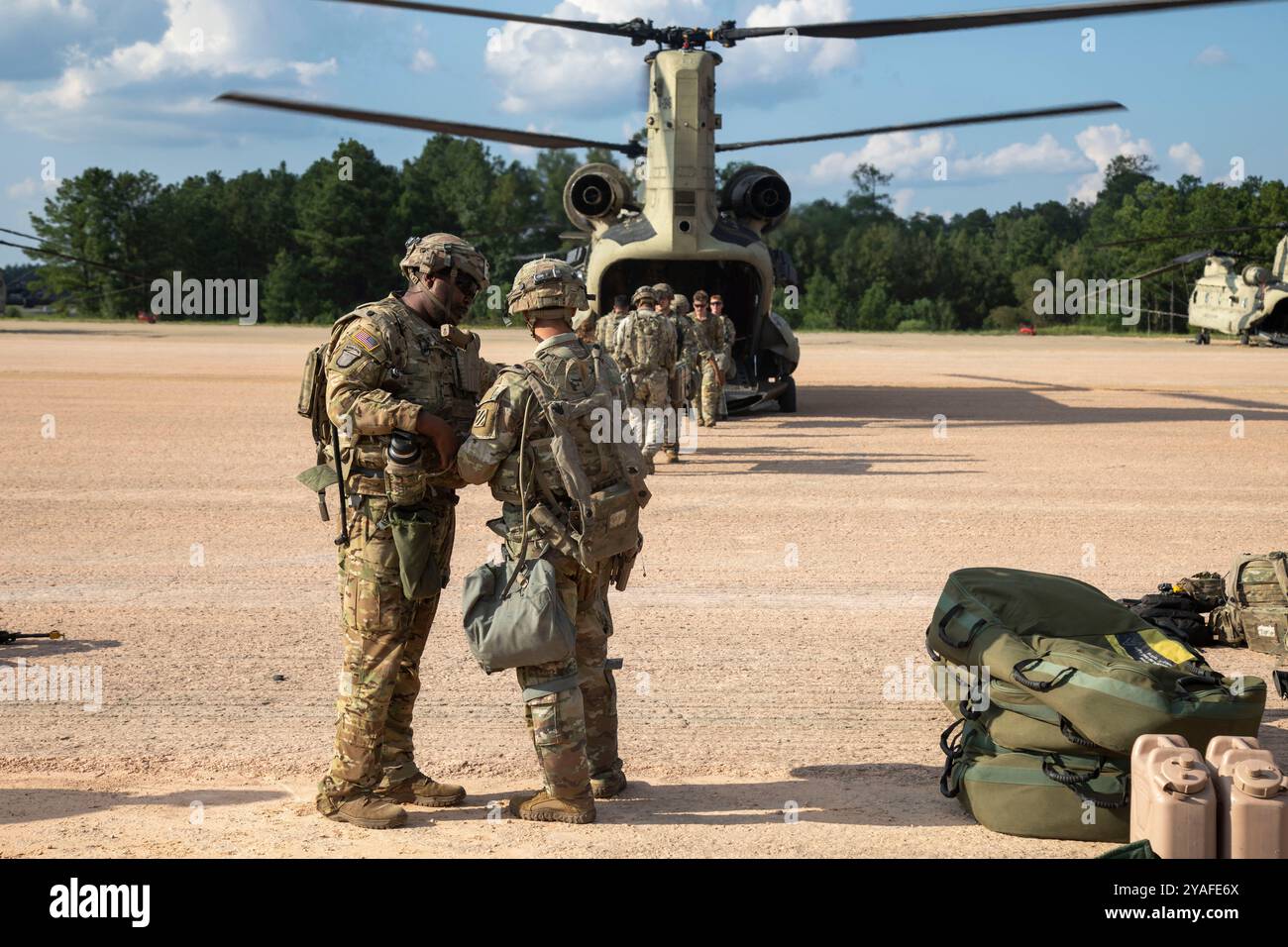 U.S. Army Staff Sgt. Blanton talks with 1st Lt. Ratton after successful ...