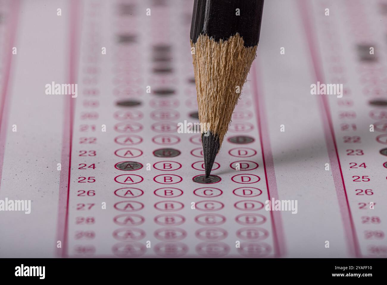 Exam, a hand taking an exam with a pen on an optical reader. Exam, an ...