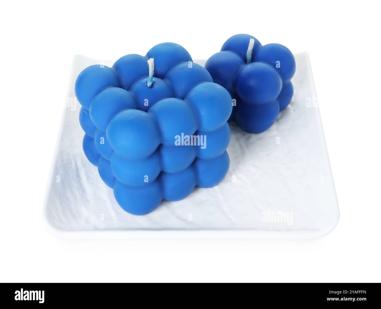 Two blue bubble candles isolated on white Stock Photo - Alamy