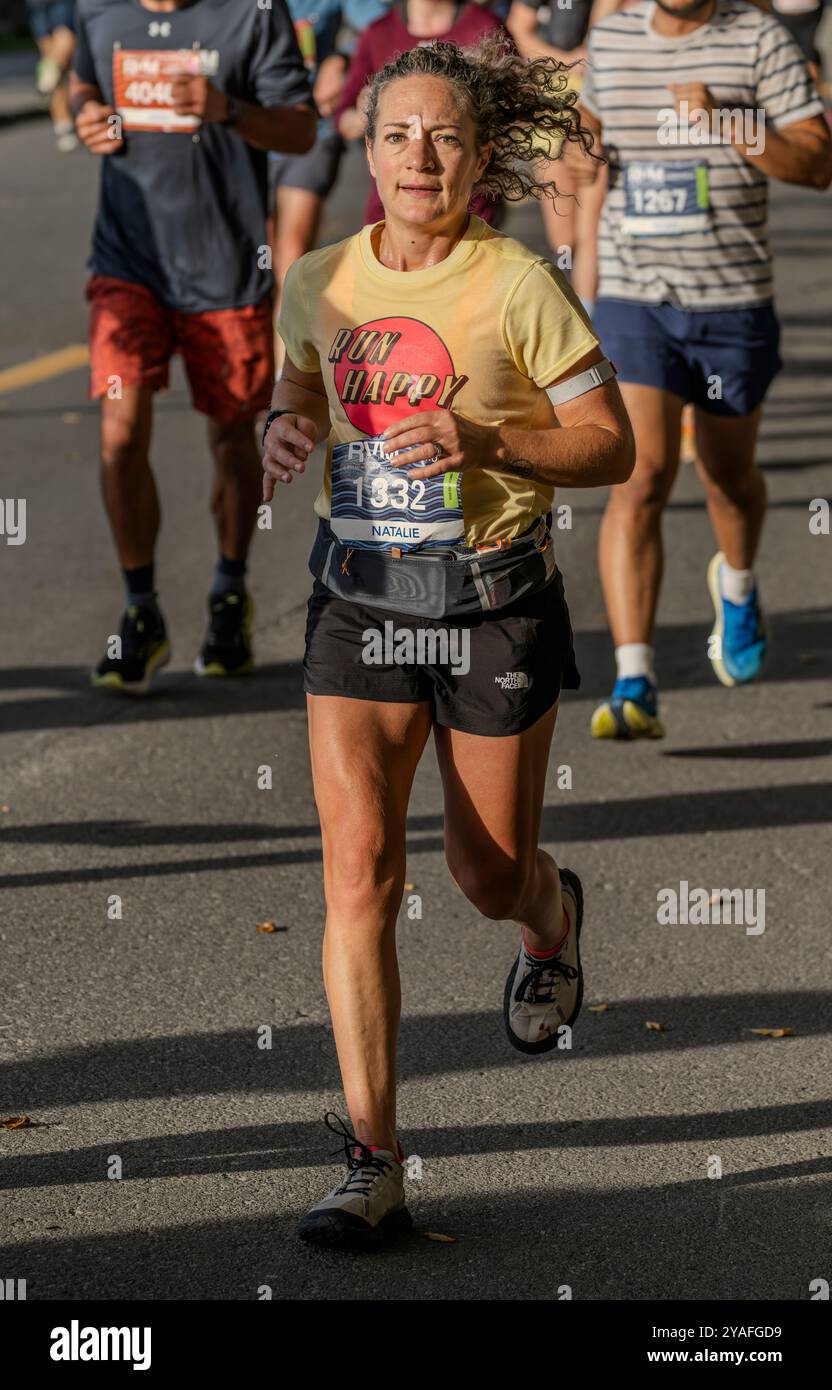 A runner in the Royal Victoria Marathon on Dallas Road at Ross Bay in ...