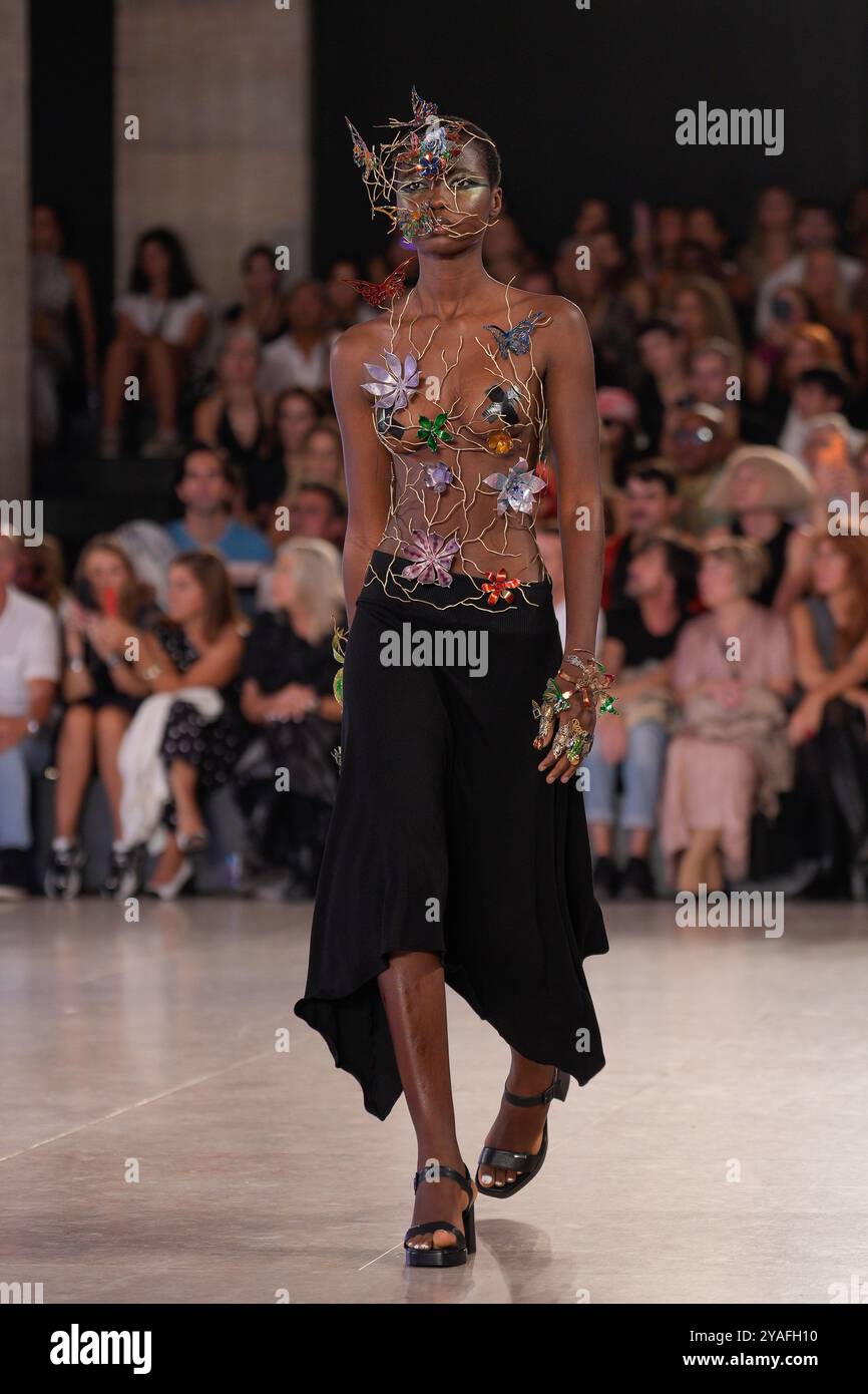 A model walks the runway during Valentim Quaresma fashion show at ...