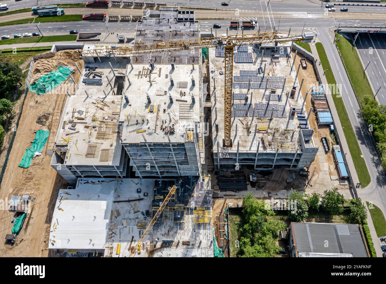 new shopping mall under construction. concrete construction site with ...
