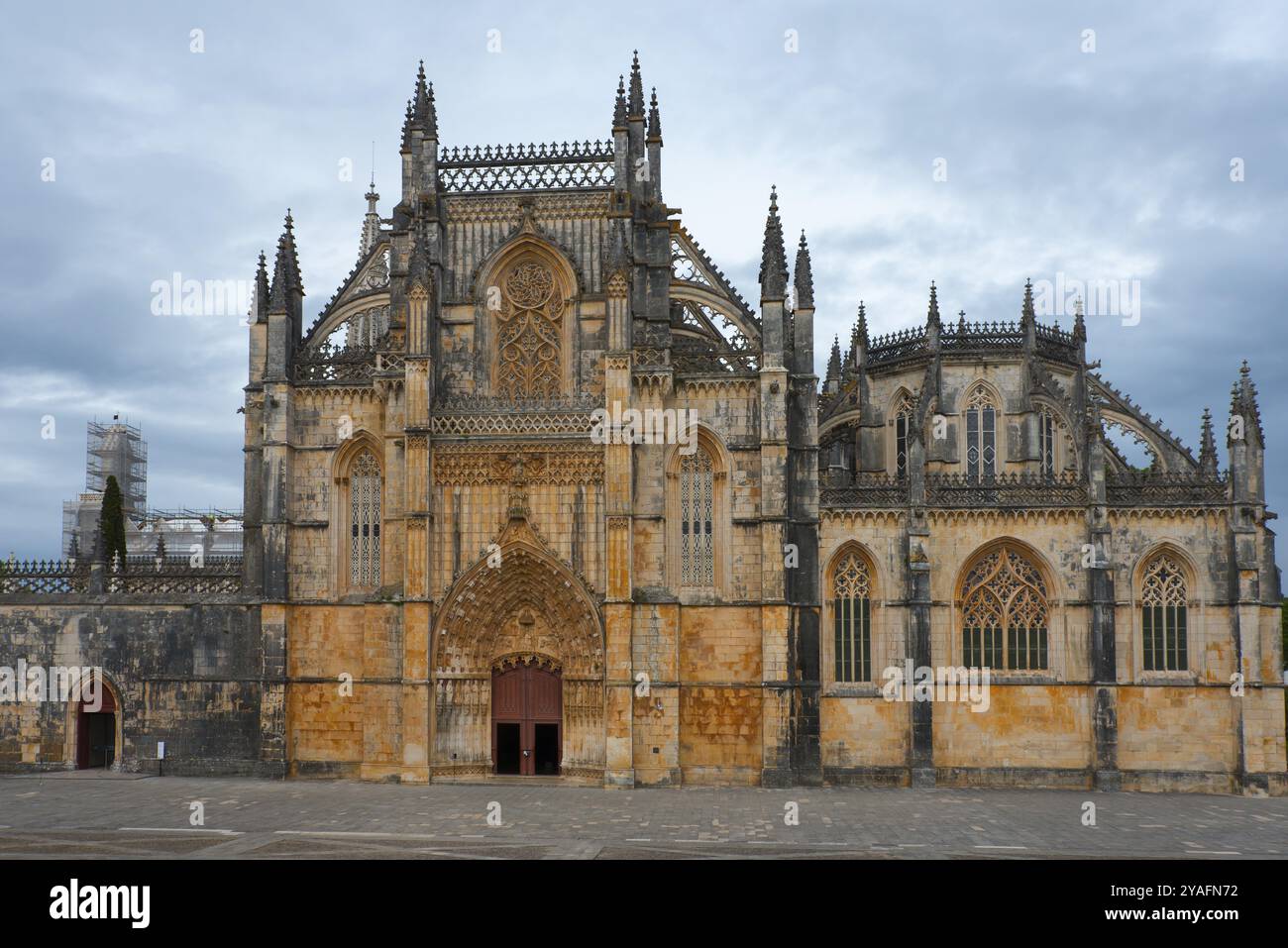 Large Gothic cathedral with impressive facade and pointed towers under ...