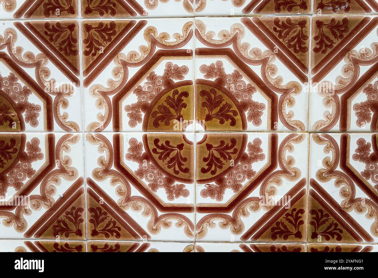 Traditional ceramic tiles with red and brown decorative pattern ...