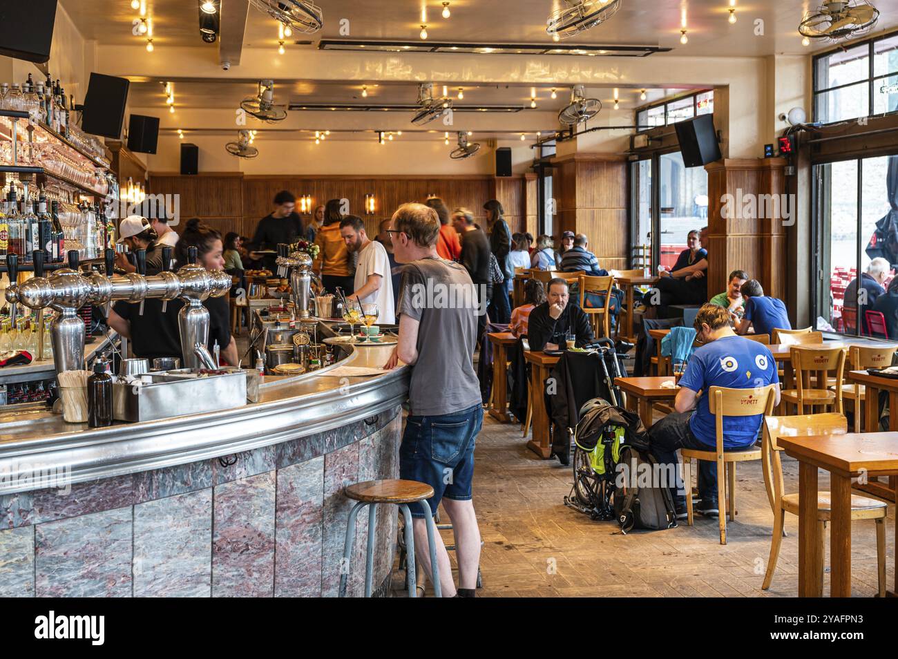 Ixelles, Brussels Capital Region, Belgium, 06 05 2022- Man ordering at ...
