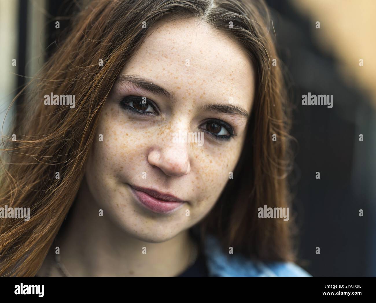 Fashion portrait of an 18 year old red haired pritty girl standing ...