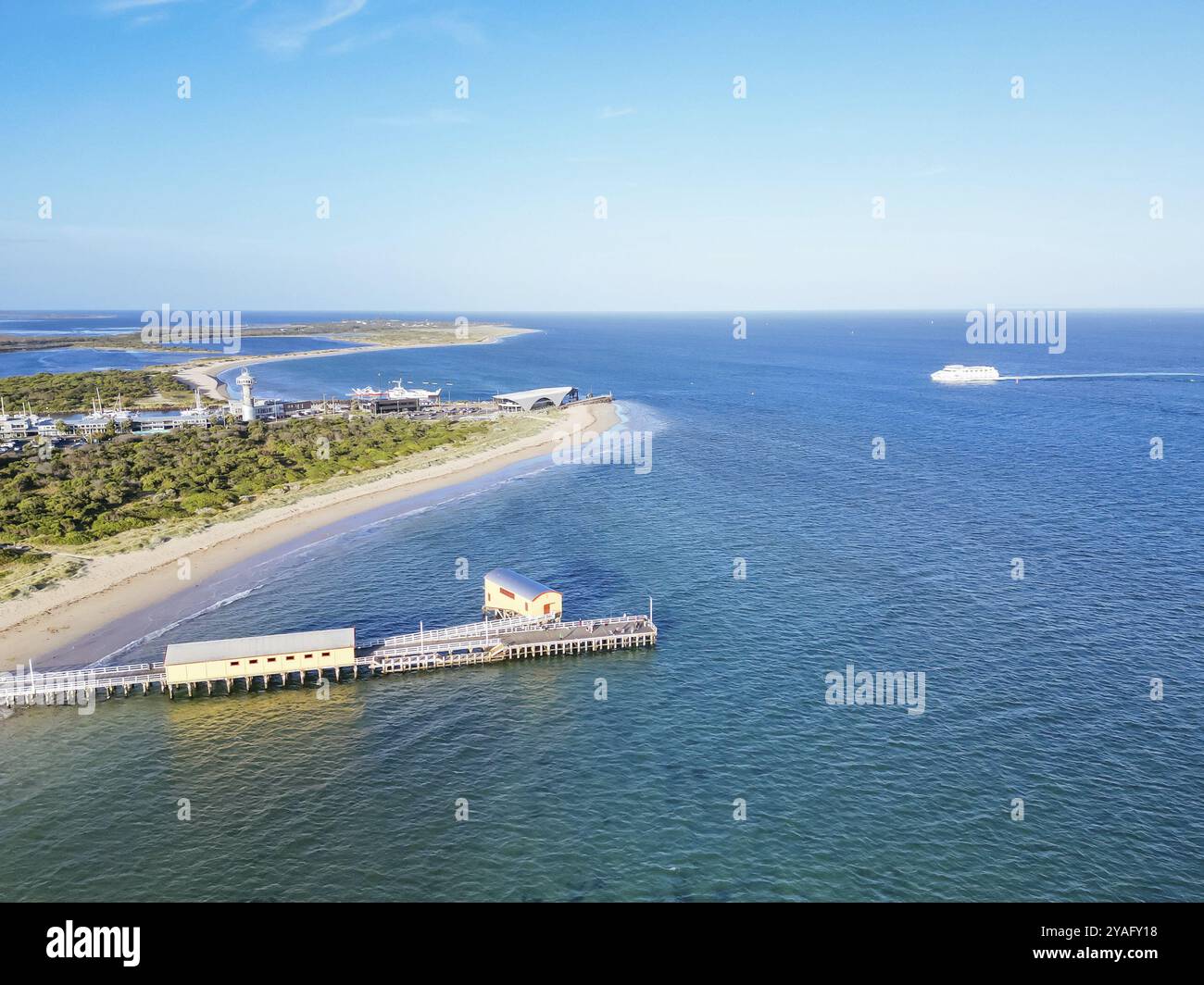 Aerial views of Queenscliff pier and Sorrento ferry area at dusk on a ...