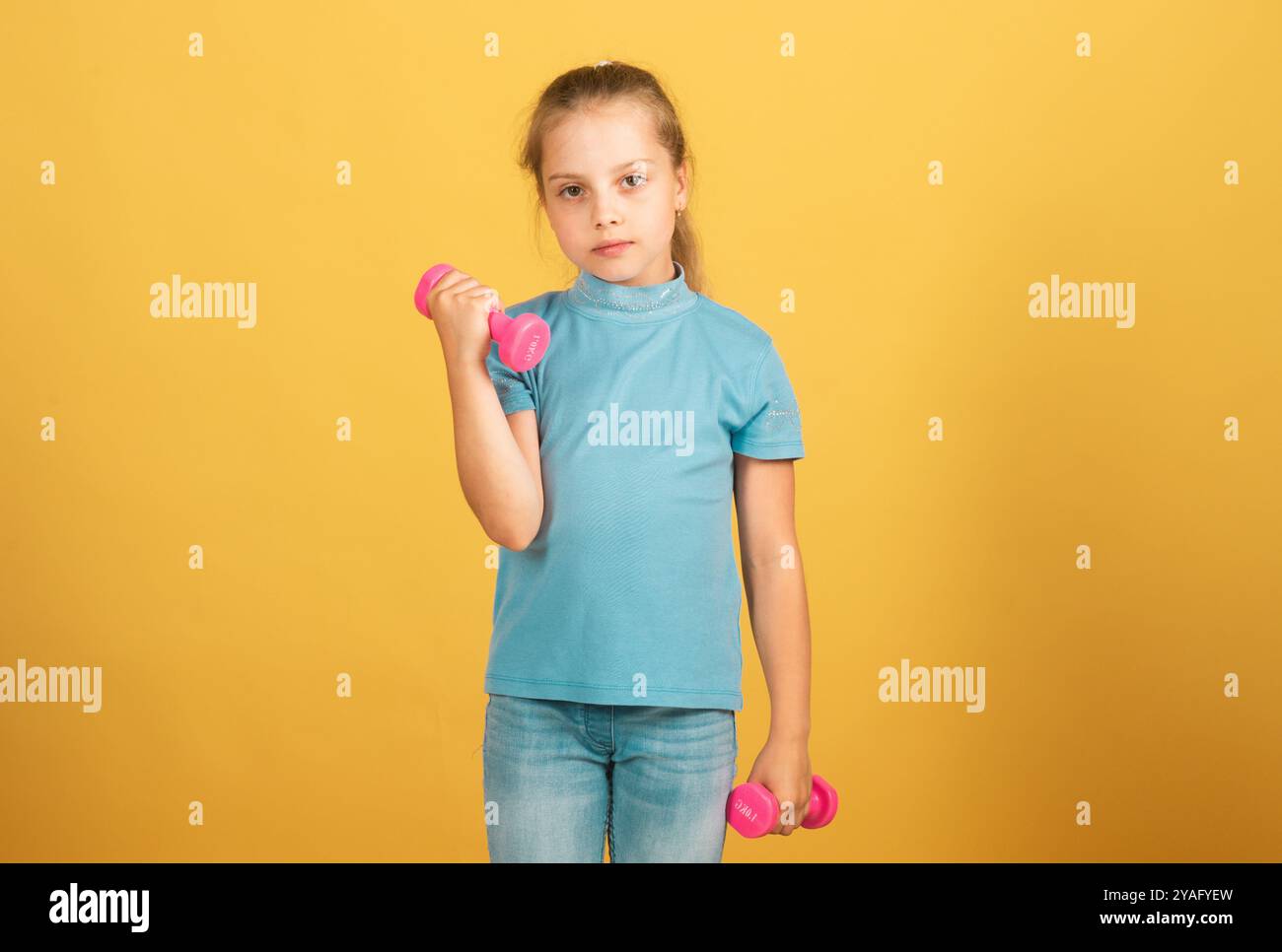 Girl doing exercises dumbbells hi-res stock photography and images - Alamy