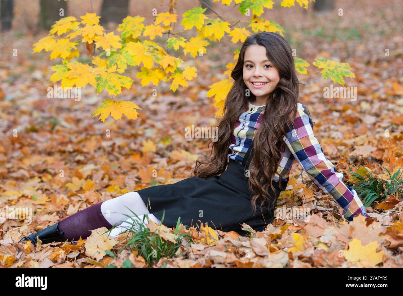 Girl in fall park wear uniform. Teen autumn uniform style. Autumn girl ...