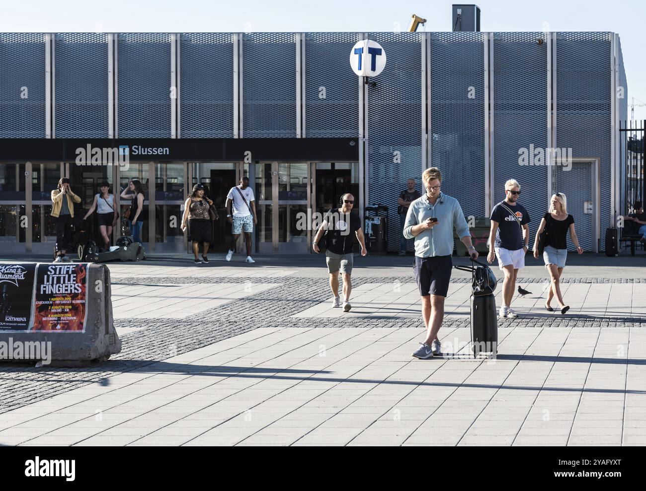 Stockholm, Sweden, 07 24 2019- Commuters walking to and from the ...