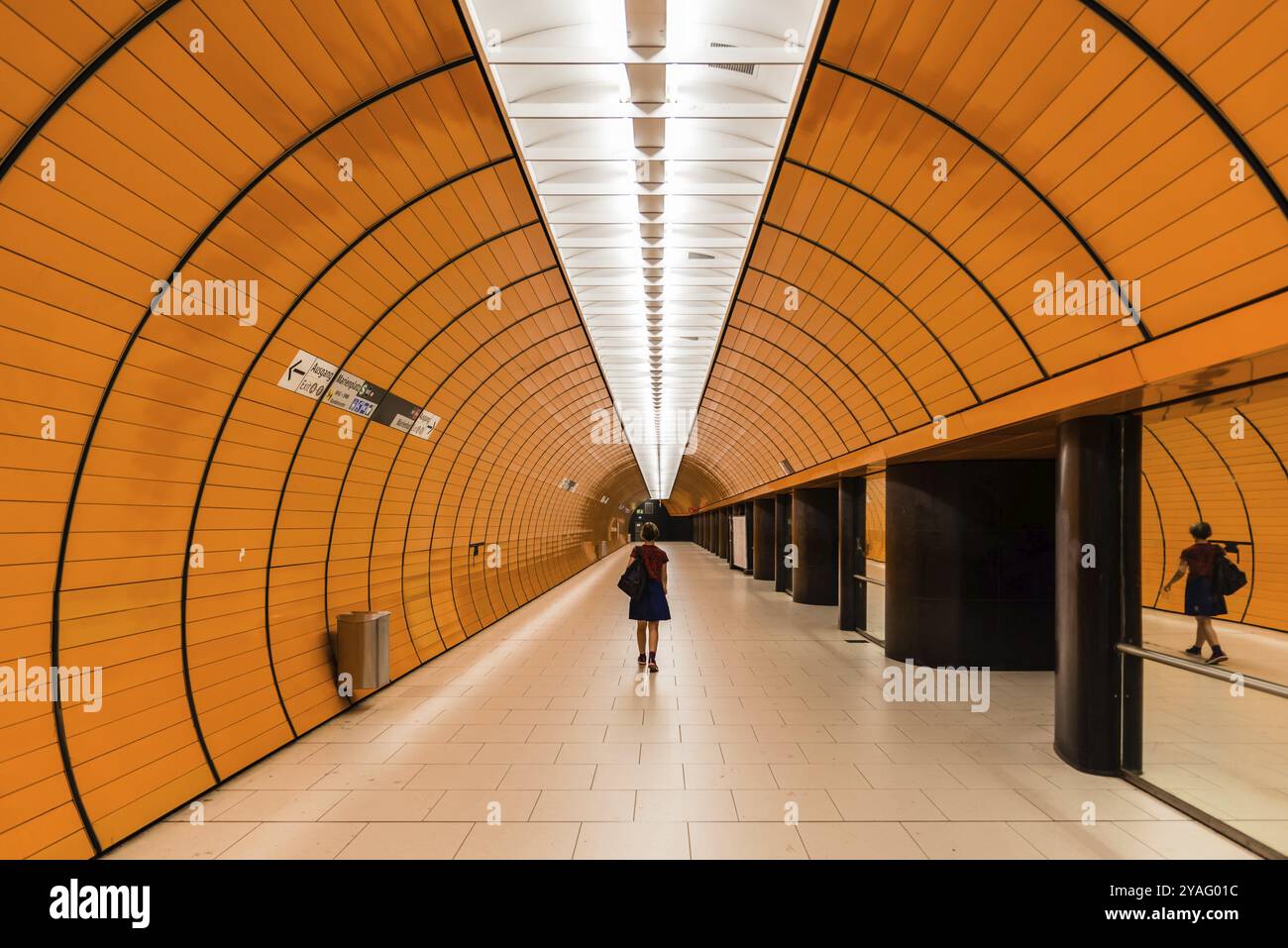 People walking through underground tunnels hi-res stock photography and ...