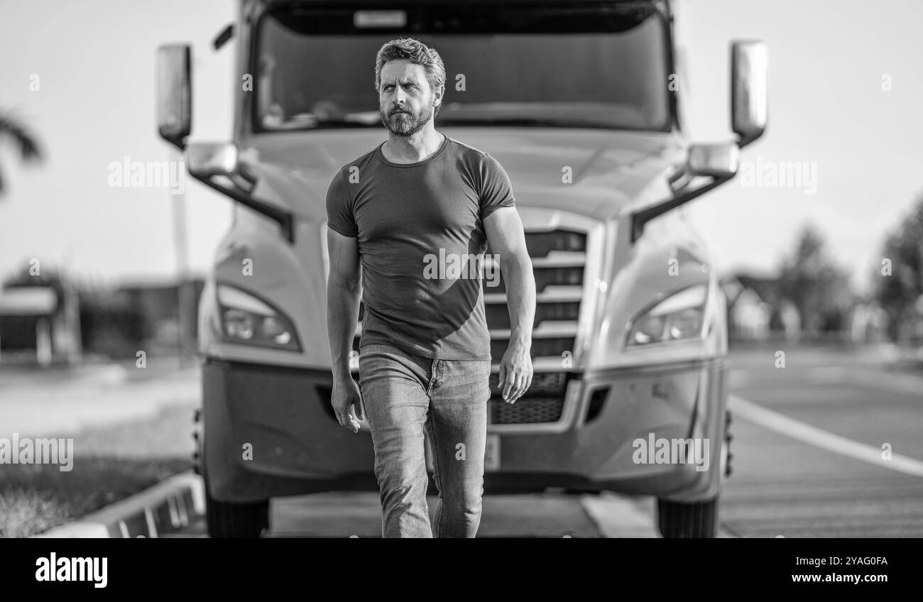 Transportation vehicles. hispanic man posing in front of truck. Semi ...