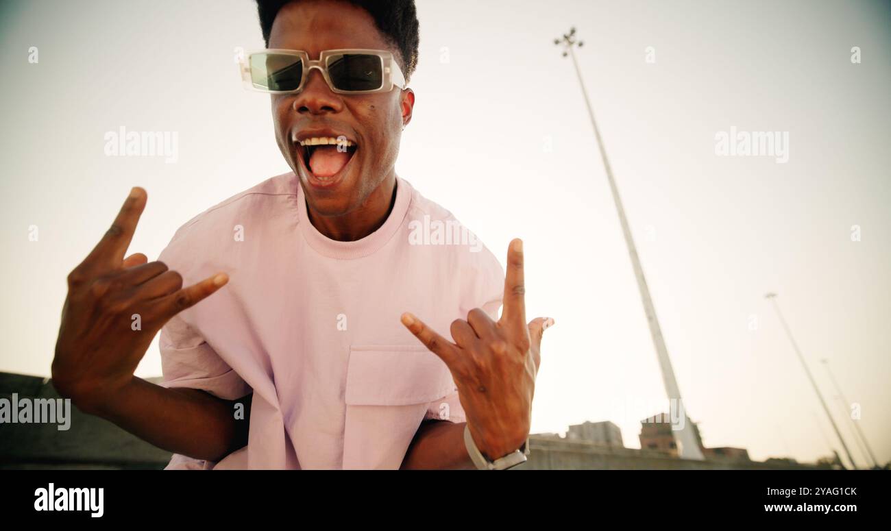 Rock, gen z and student with portrait of black man in city for youth ...