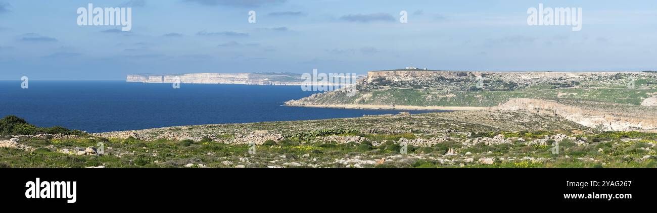 The green and blue coastal line with rocks, bays and mountains around ...