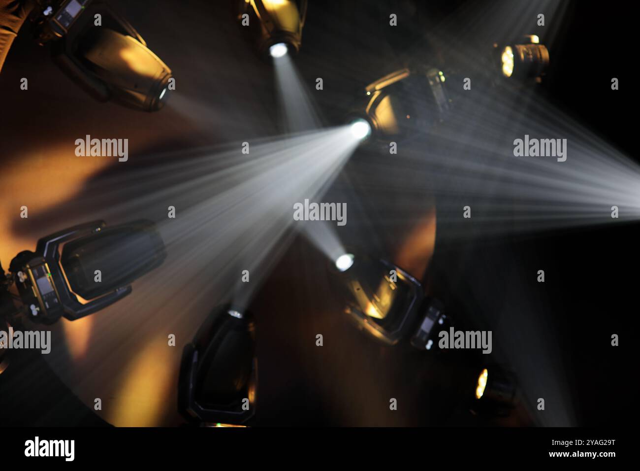 LED spot moving head lights hang over the stage. Soft focus Stock Photo ...