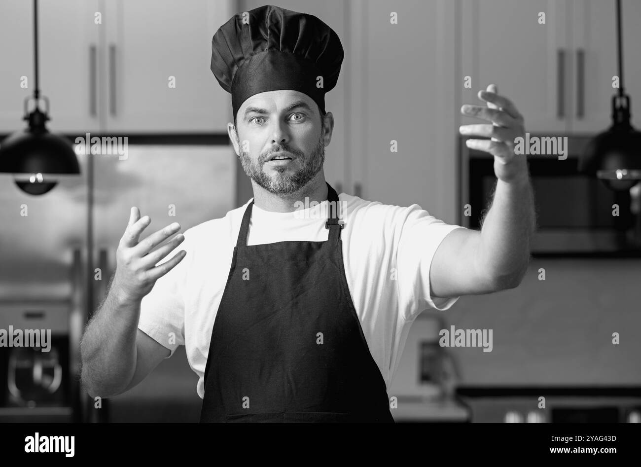 Man chef in uniform hat Black and White Stock Photos & Images - Alamy
