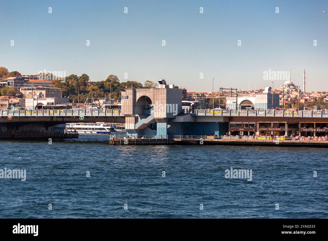 Istanbul, Turkiye - OCT 8, 2024: The Galata Bridge that connects two ...