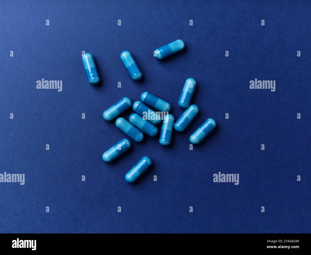Amino acids capsules on dark paper background. Soft focus Stock Photo ...