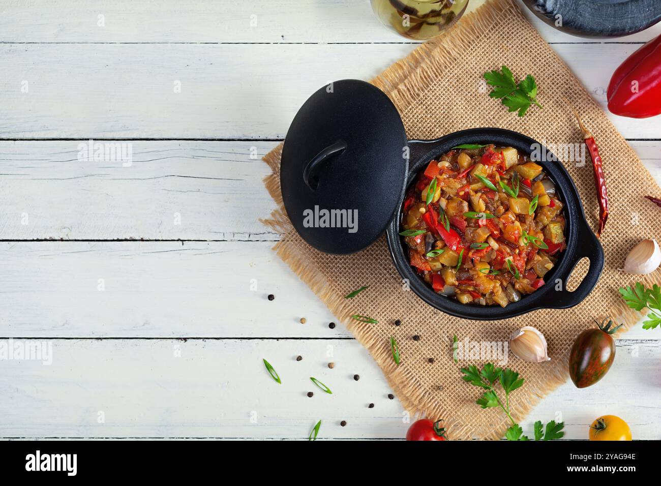 Stewed vegetables with tomato sauce and herbs. Spicy vegetable stew ...