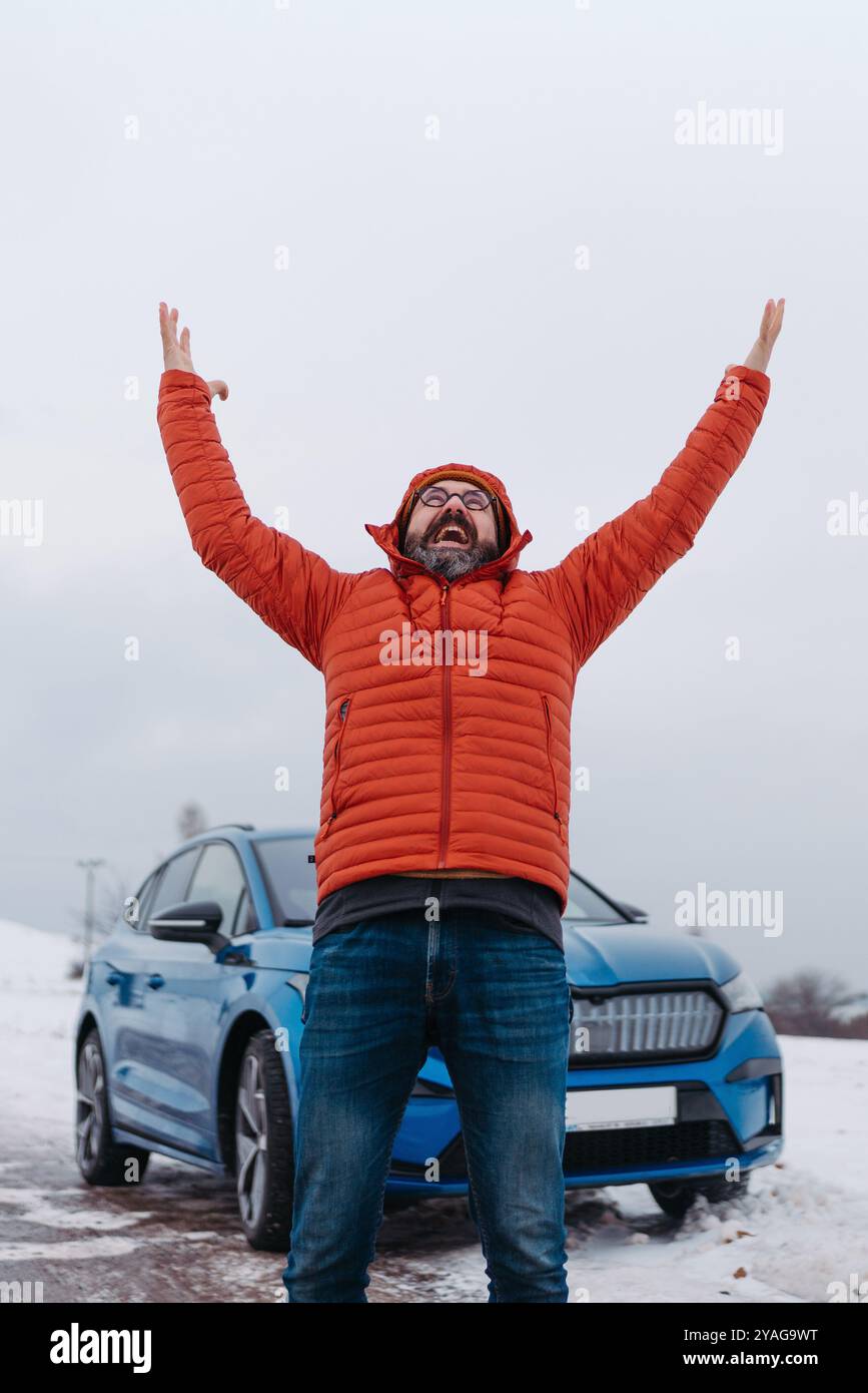 Angry man with broken electric car, battery run out of power before ...