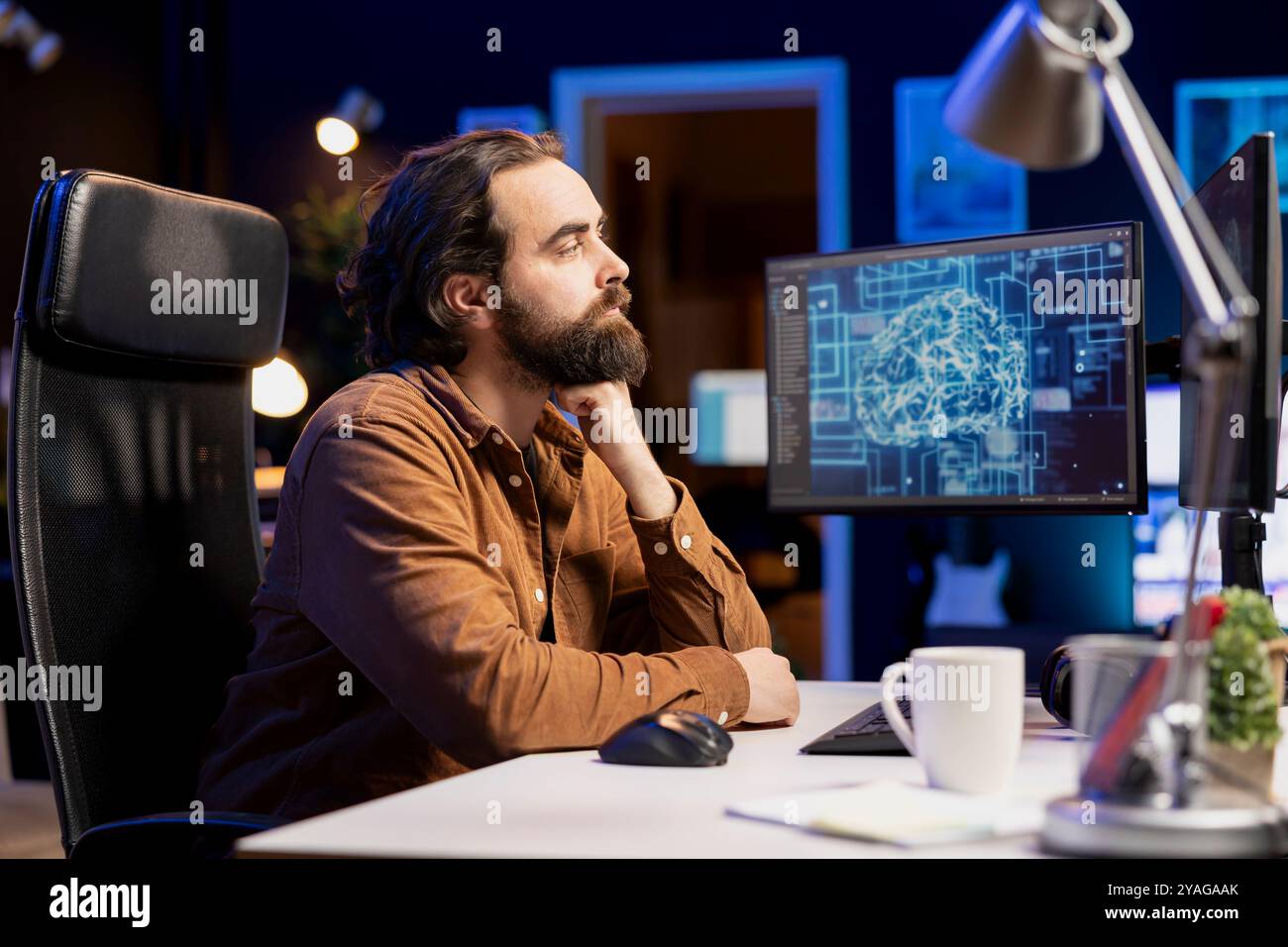 Computer scientist using PC to maintenance artificial intelligence neural networks simulating ...