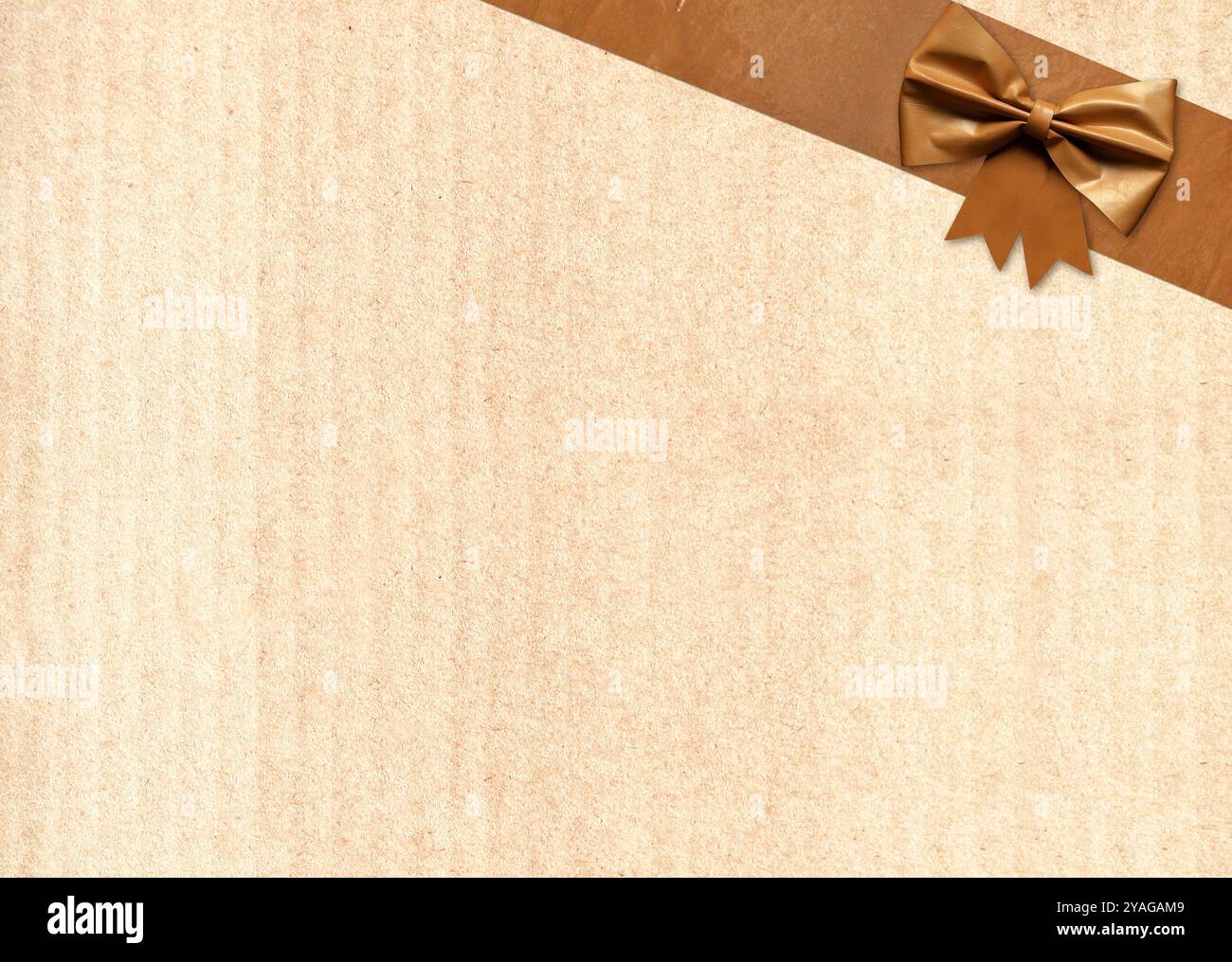 Paper package covered in adhesive tape with decorative bow. Masking ...