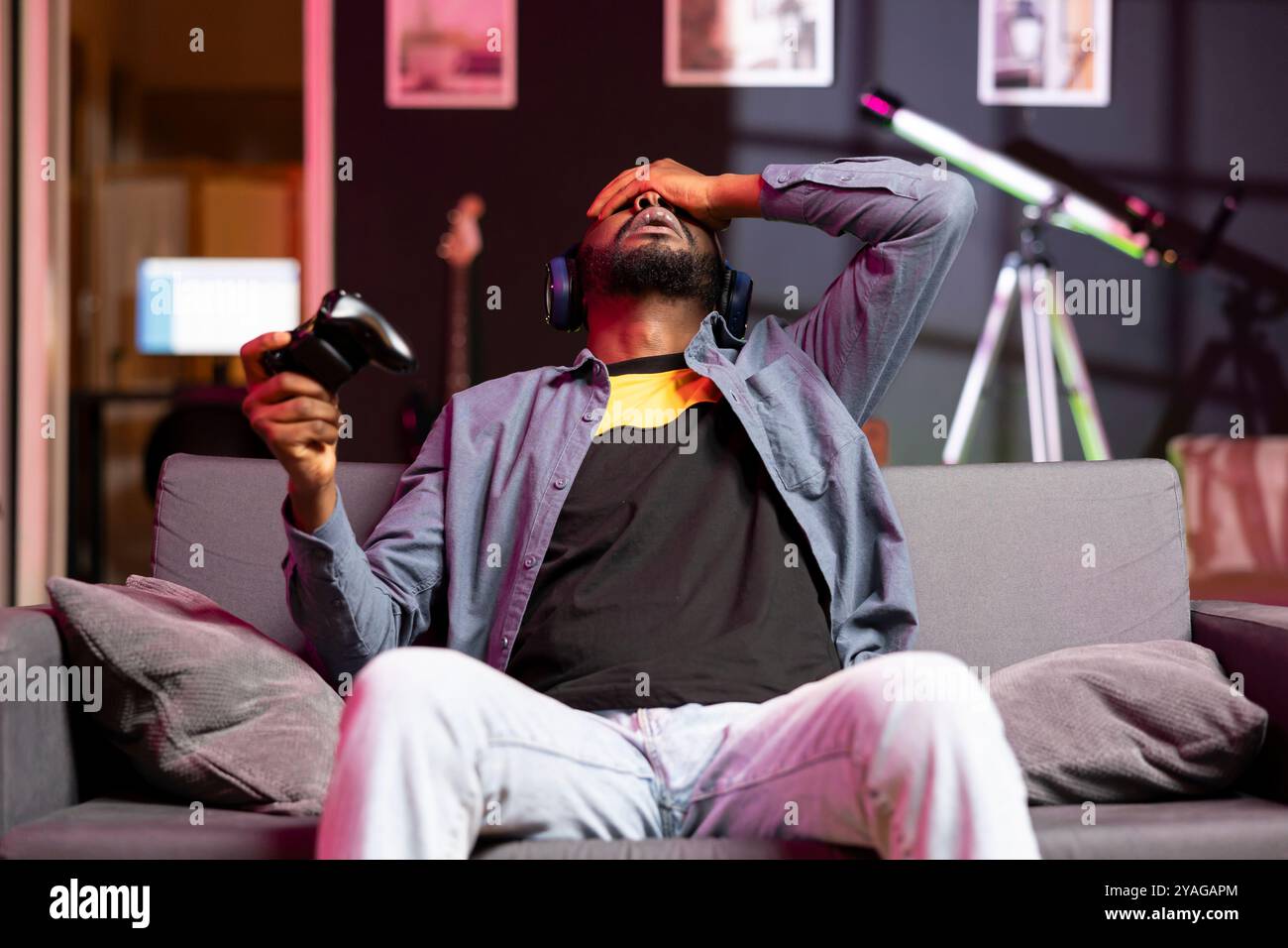 Gamer Upset After Losing While Playing Videogames On Console System Using Controller Man