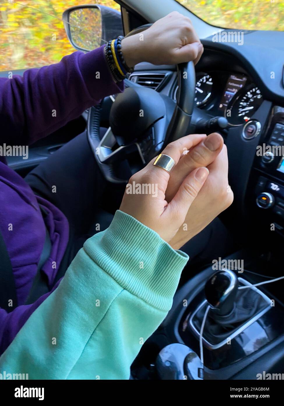 Couple Holding Hands in Car Stock Photo - Alamy