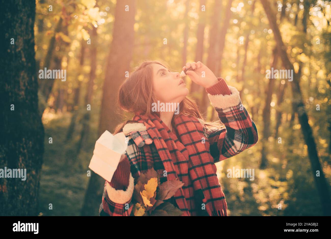 Portrait Of Young Woman Sniffing Nasal Spray Closing One Nostril. Young ...