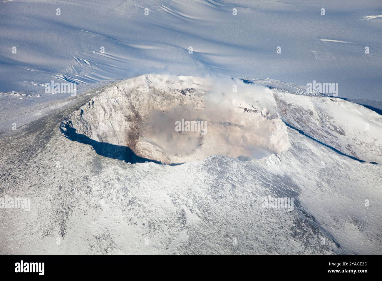 Aerial view of the summit and caldera of Mt Erebus, the southern-most active volcano in the ...