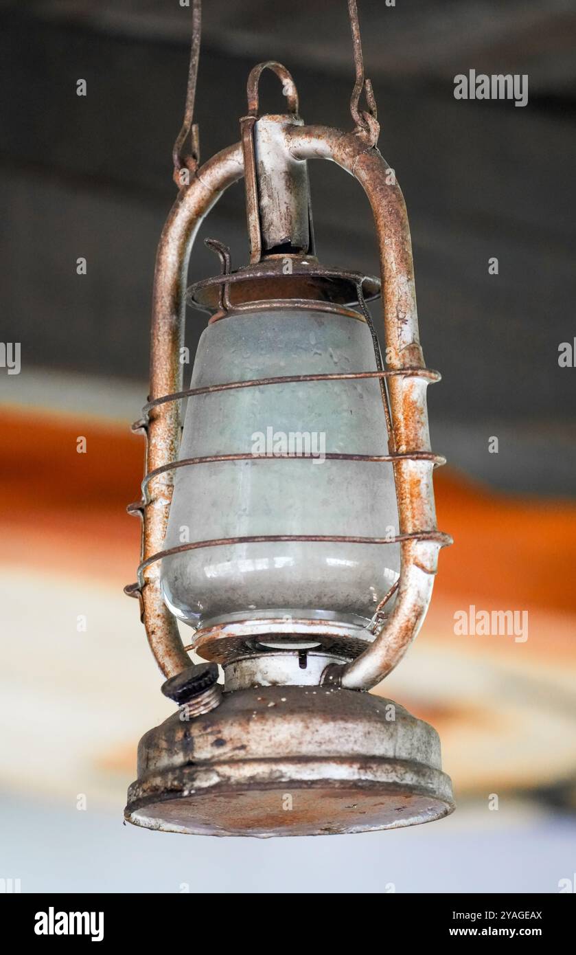 Old hanging metal oil lamp close-up Stock Photo - Alamy