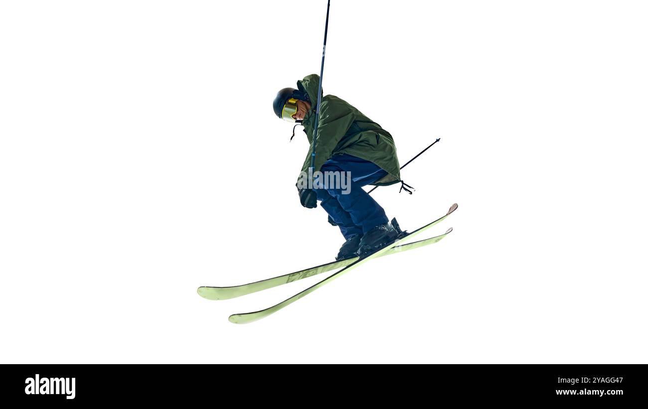 High-speed jump mid-slope, capturing skier in action as he defies ...
