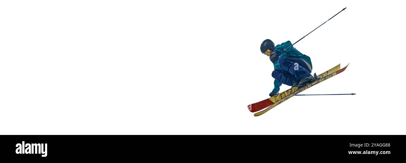 Mid-air with smooth posture, skier floats effortlessly through air ...