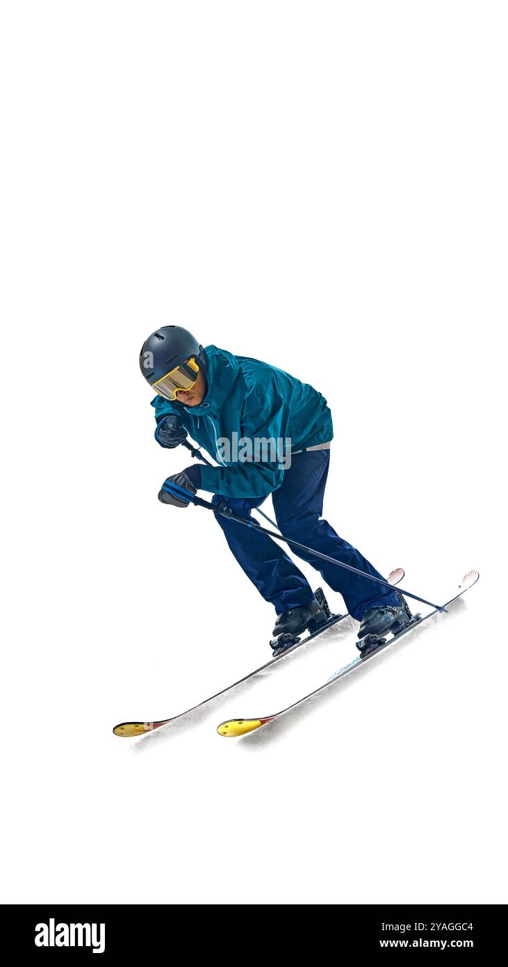 Skier mid-run, leaning into action with determined look, showcasing ...