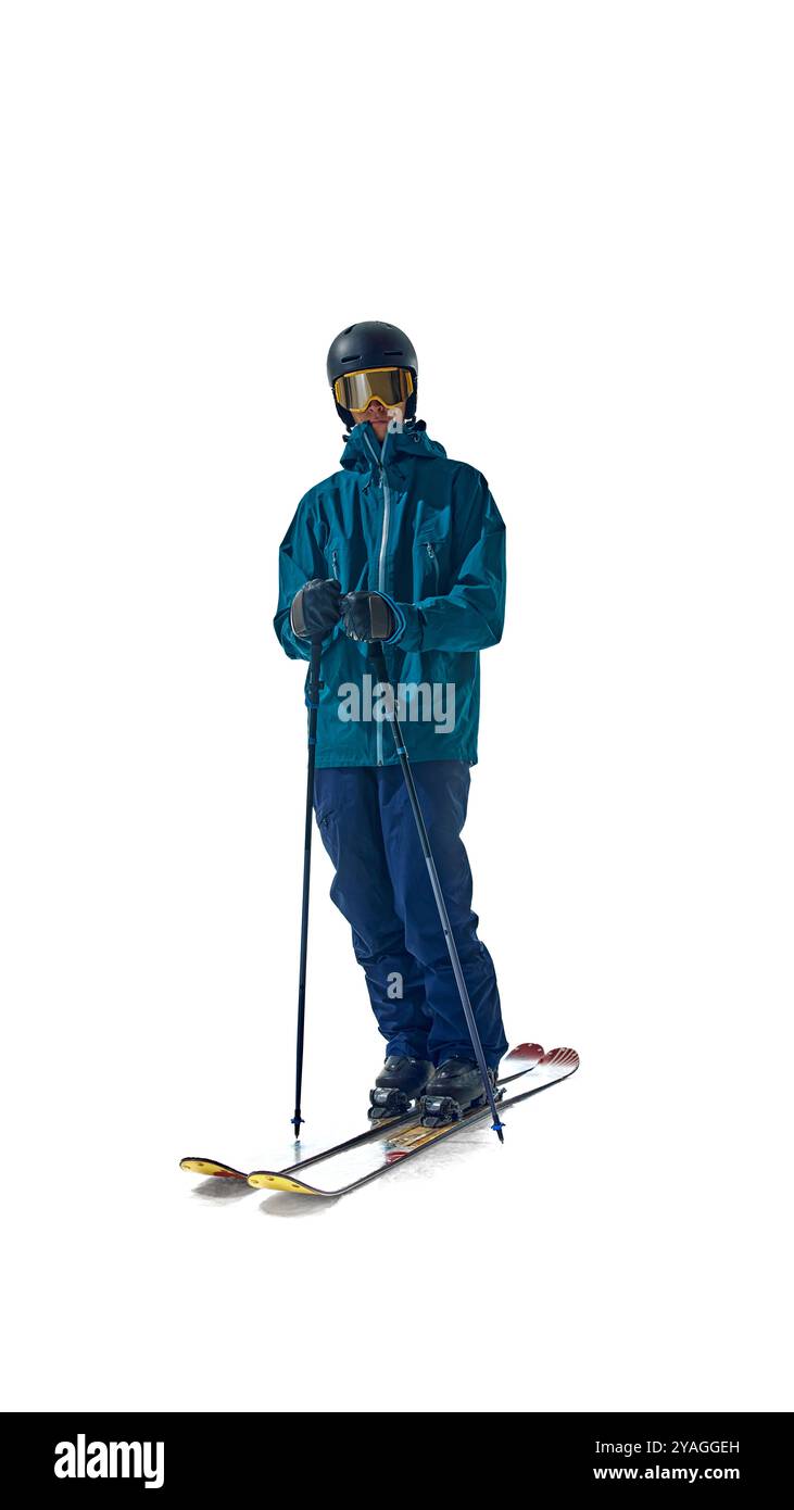 Standing tall after successful run, skier poses confidently in full ...